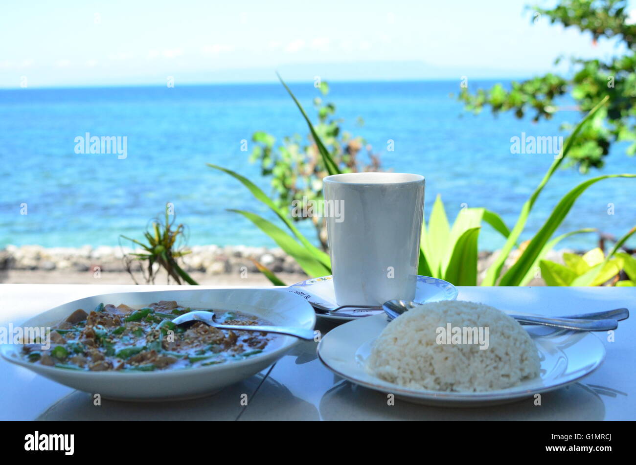 Typical Indonesian breakfast with rice and vegetables Stock Photo - Alamy