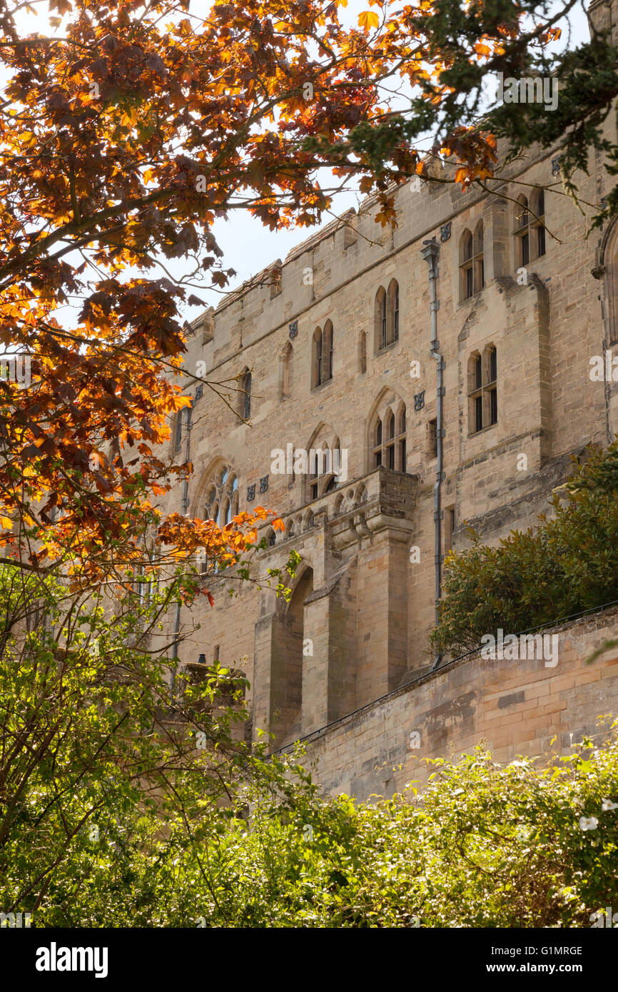 The walls of medieval Warwick Castle seen through the trees, Warwick ...