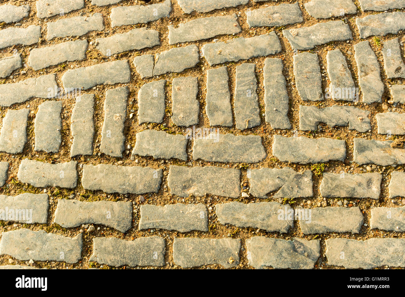 A pattern in a old cobblestone footpath Stock Photo - Alamy