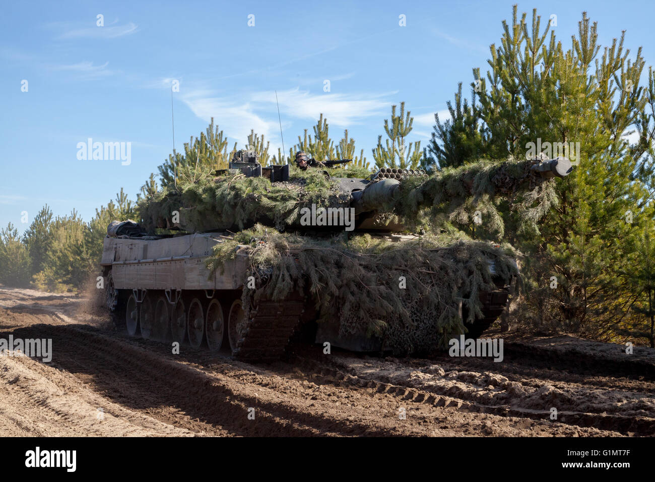 german main battle tank drives on track Stock Photo - Alamy