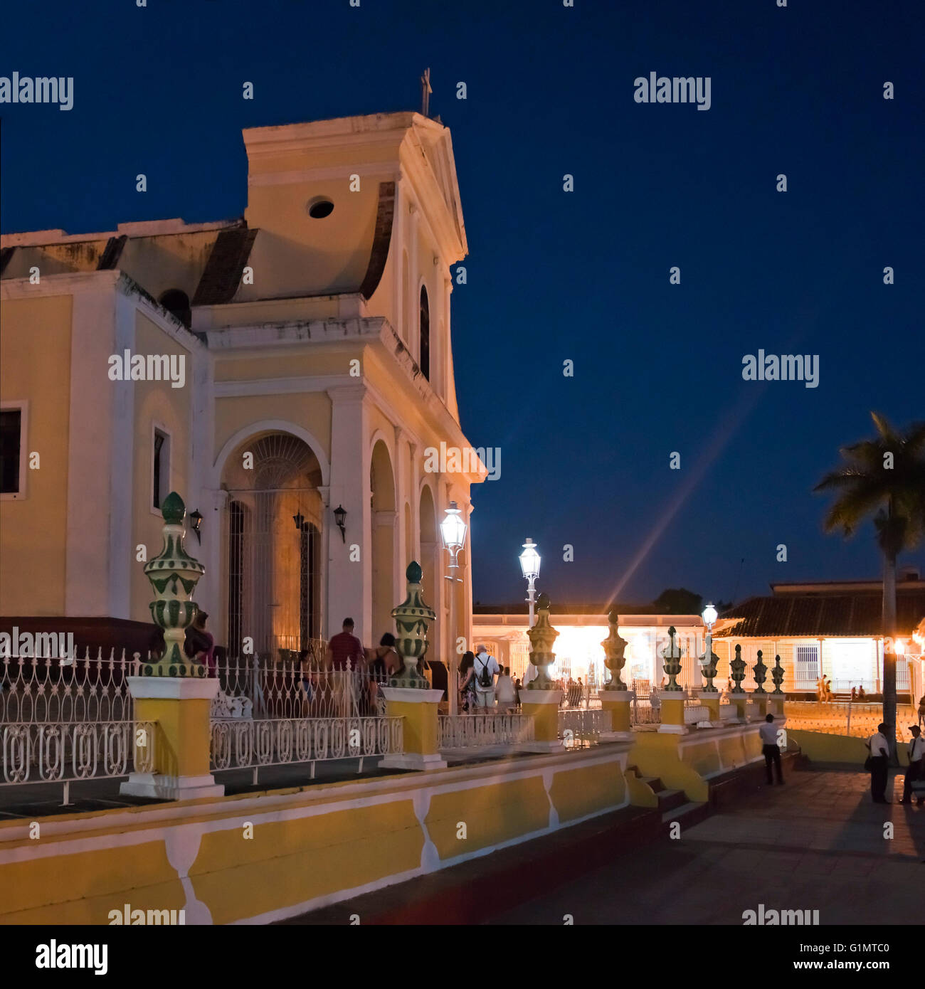 Square view of the Church of the Holy Trinity in Trinidad at night ...