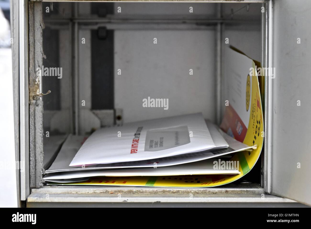 An open mailbox full of mail Stock Photo - Alamy