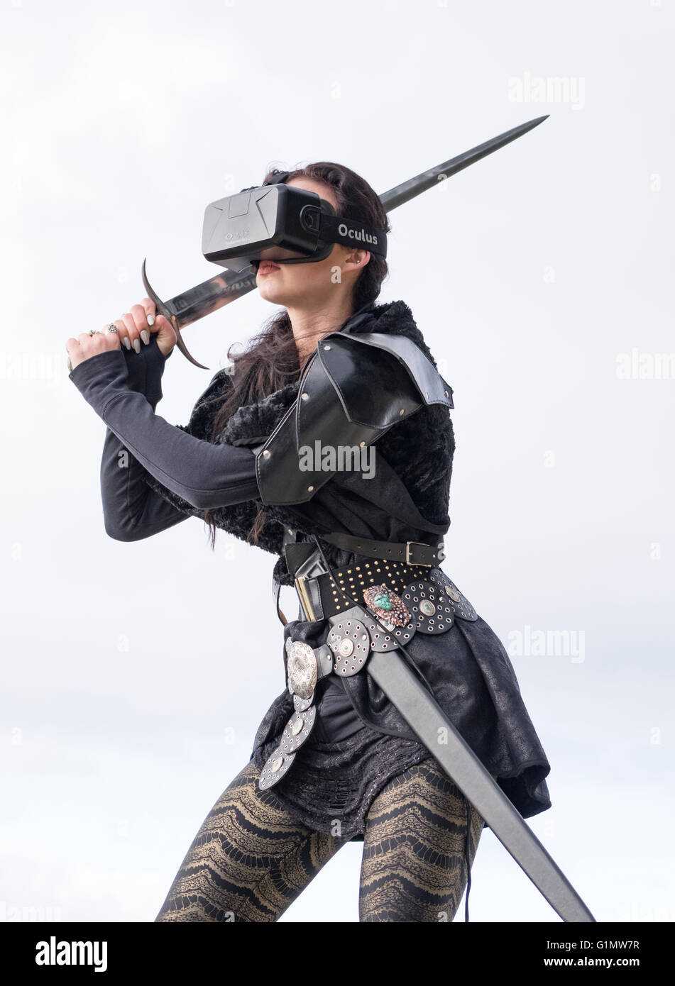 Conceptual picture of a young woman wearing costume and Oculus Rift ...
