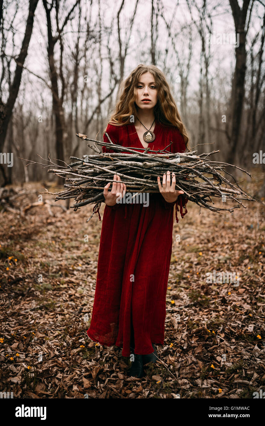 Witch in forest Stock Photo - Alamy