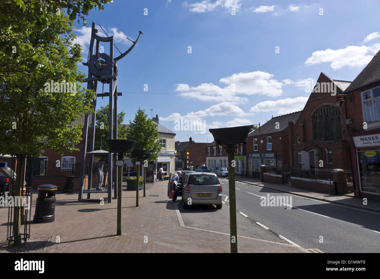 Highley village with the Clock Sculpture Miners’ Memorial Stock Photo ...