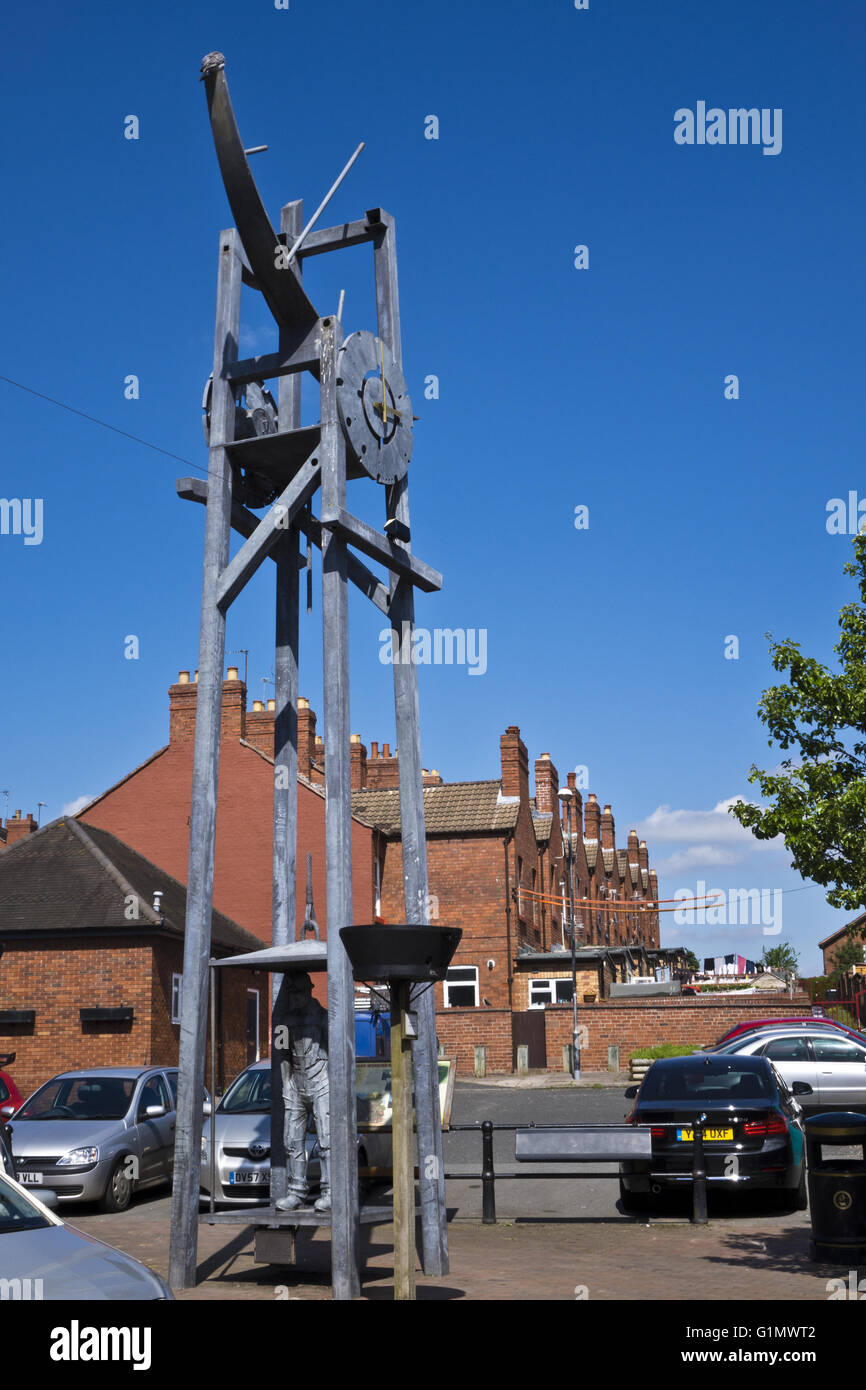 Highley village with the Clock Sculpture Miners’ Memorial Stock Photo ...