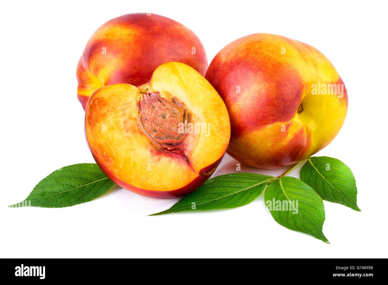 Nectarine organic fruits with leaves on white background Stock Photo ...