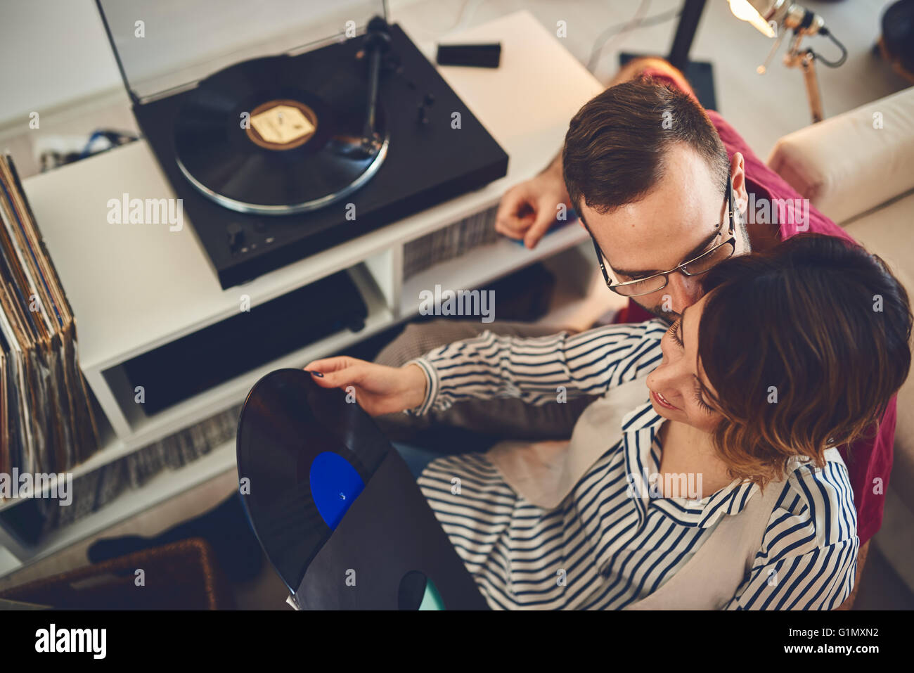 Listening music at home on the gramophone Stock Photo - Alamy