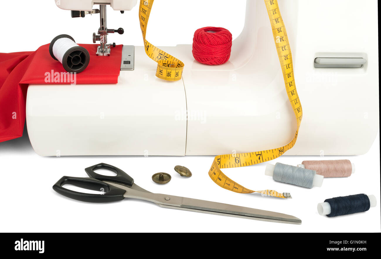 Sewing machine with fabric, threads and tape Stock Photo - Alamy