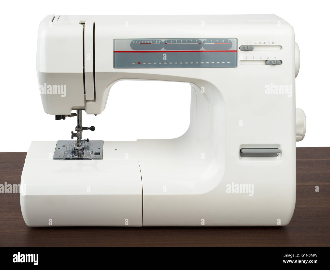 Sewing machine isolated on white background Stock Photo - Alamy