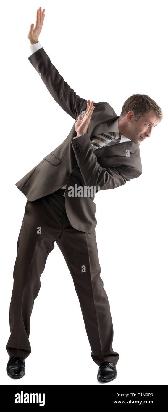Isolated business man dodge something Stock Photo - Alamy
