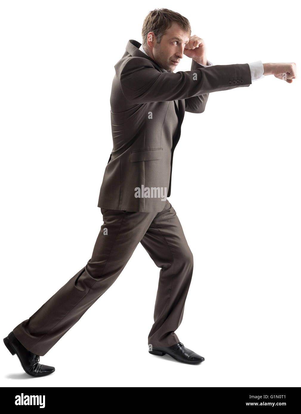 Angry businessman in formal outfit hitting Stock Photo - Alamy