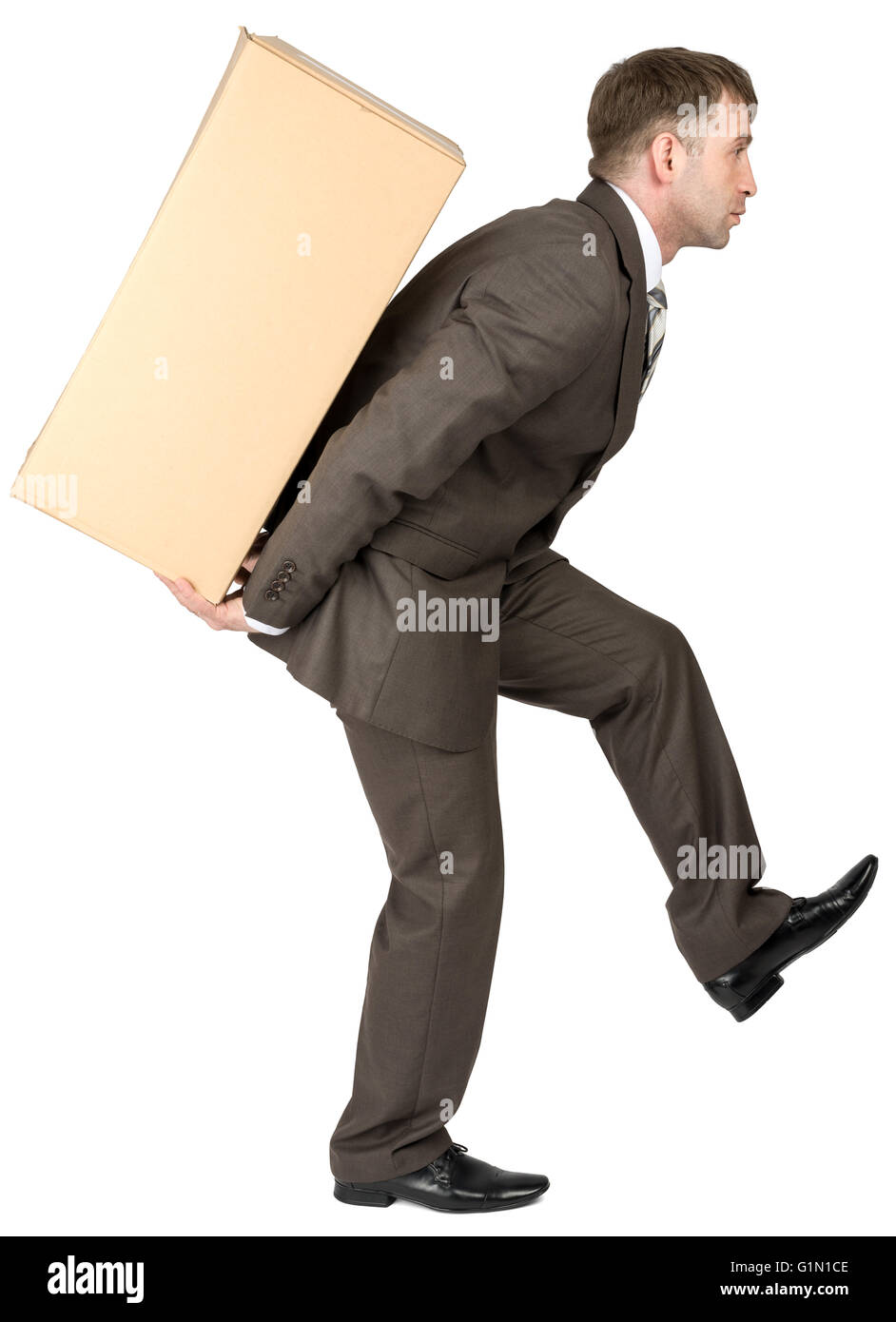 Young man in suit hold box on back Stock Photo - Alamy