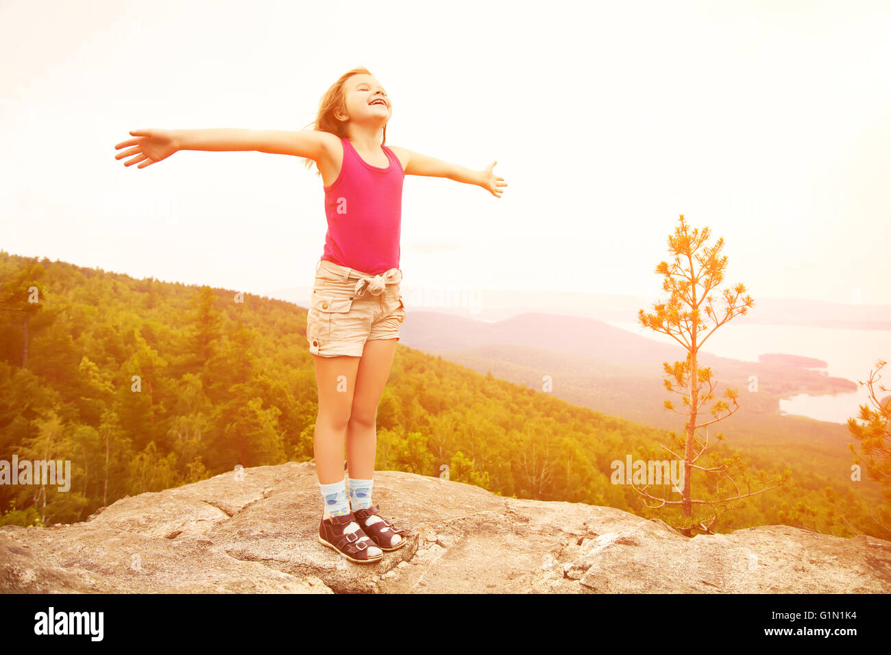 Girl at mountain top hi-res stock photography and images - Alamy