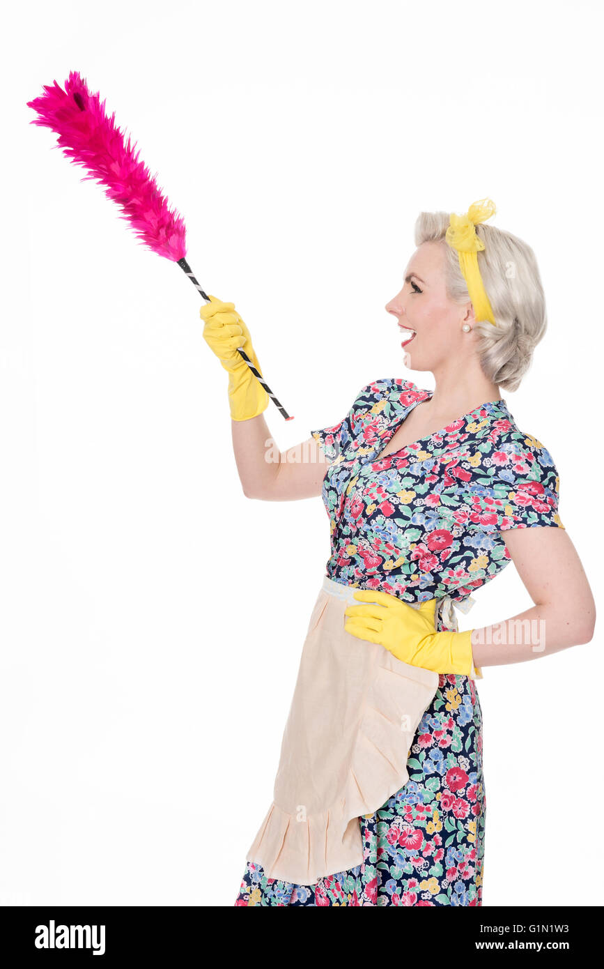 Girl with feather duster hi-res stock photography and images - Alamy