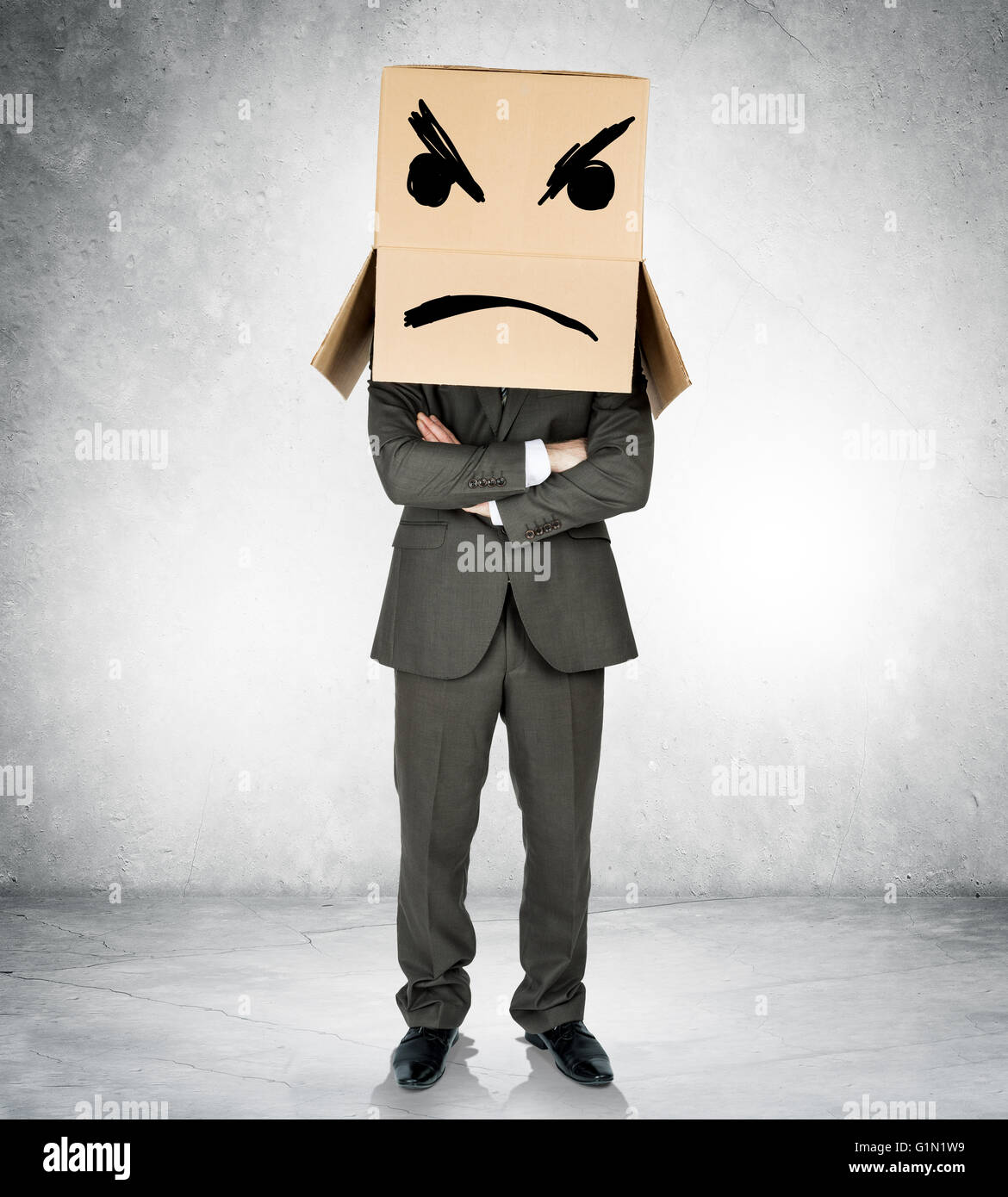 Depressed man with box over head Stock Photo - Alamy