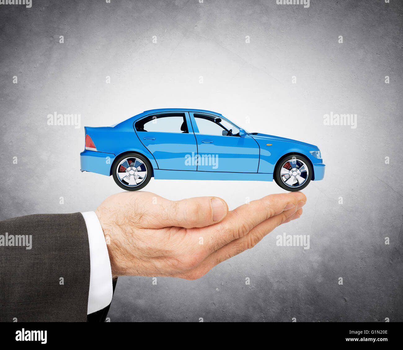 Human hand holding toy car hi-res stock photography and images - Alamy