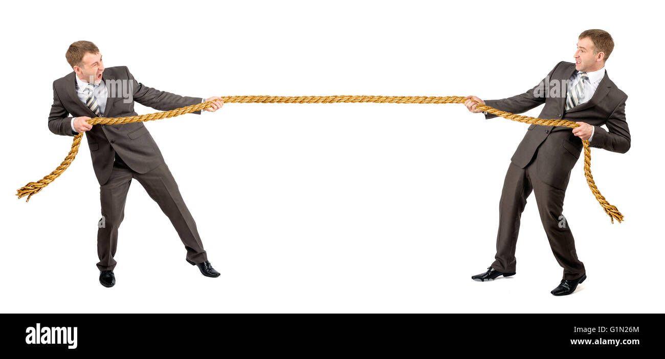 Tug war, two businessman pulling rope Stock Photo - Alamy