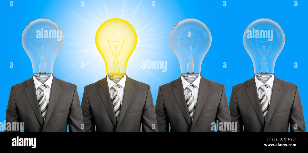 Businessmen with lamp-head Stock Photo - Alamy