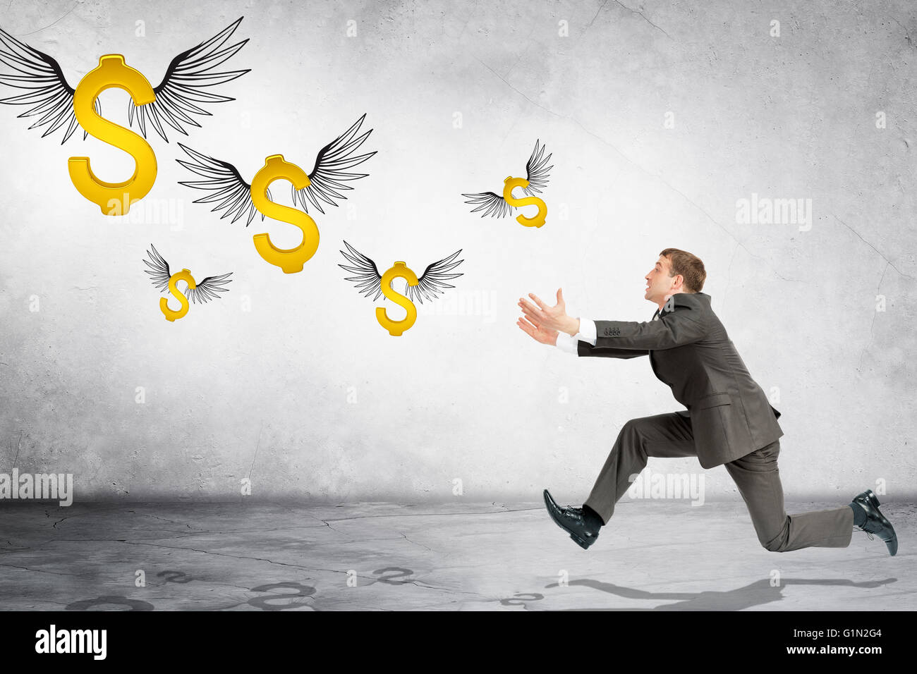 Business man running to catch flying dollar sign Stock Photo - Alamy