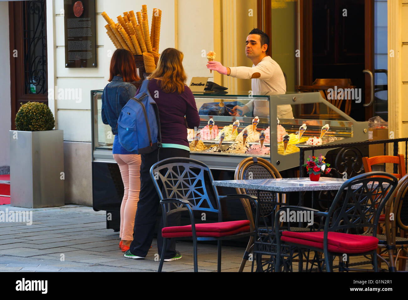 Ice cream seller in the old town of Bratislava, Slovakia Stock Photo ...