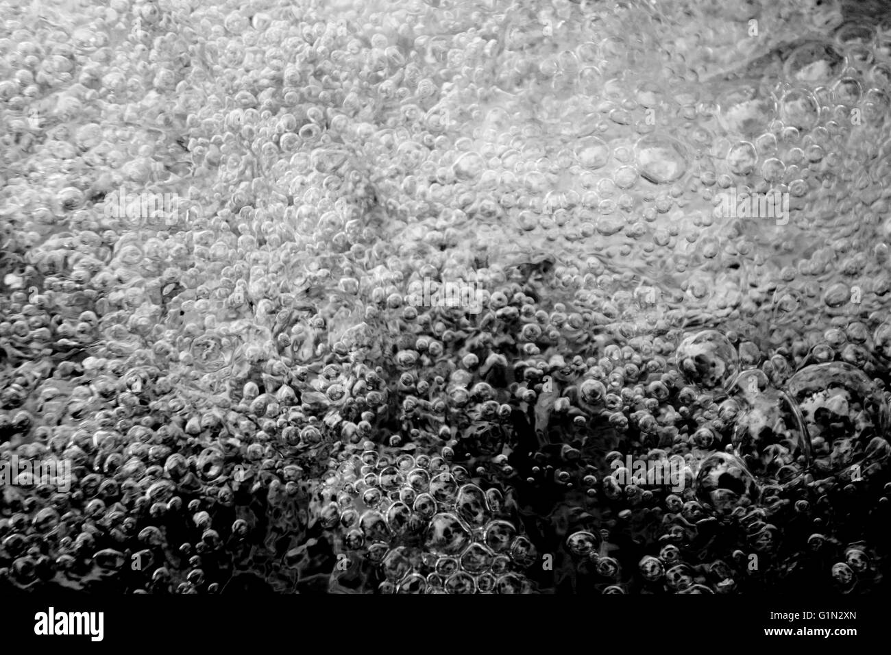 Black abstract background blue liquid Black and White Stock Photos ...