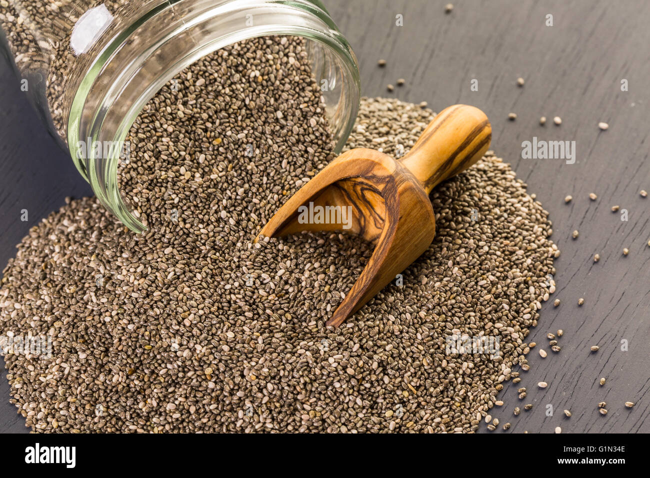 Healthy Chia seeds in glass jar close-up Stock Photo - Alamy