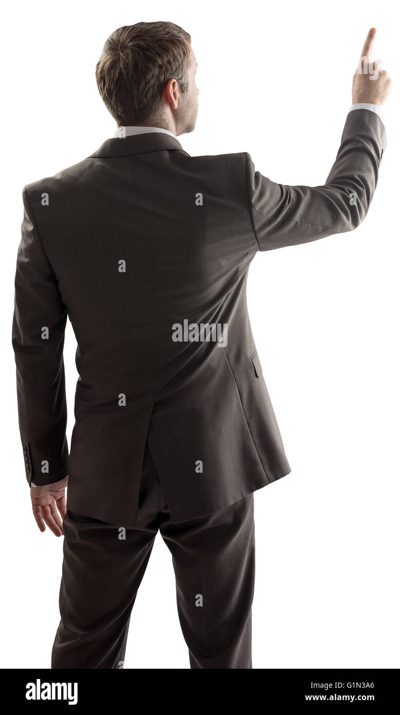 Rear view of businessman pointing at copy space Stock Photo - Alamy