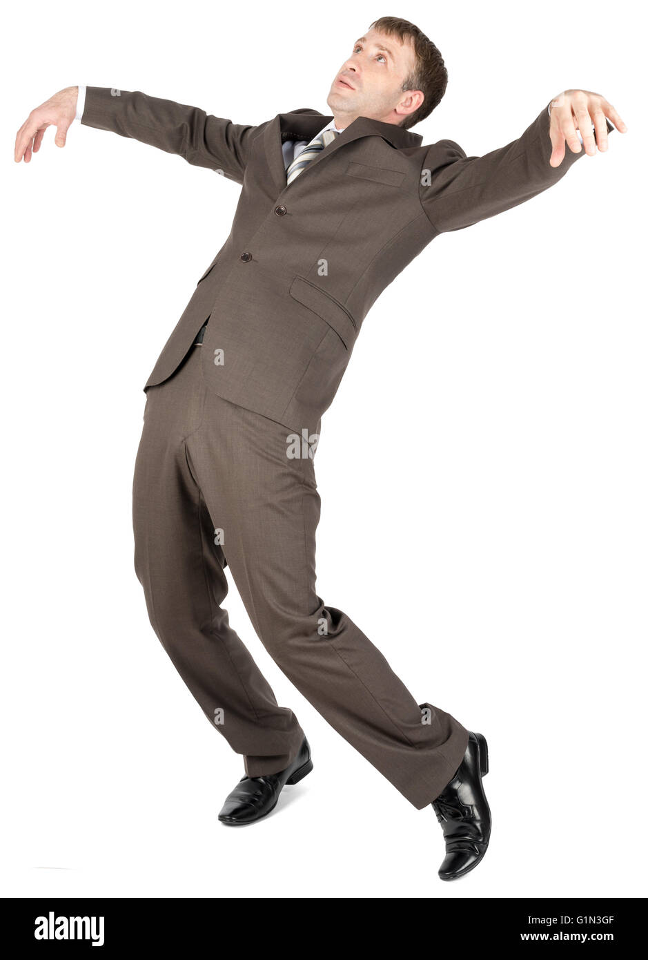 Falling businessman in formal wear Stock Photo - Alamy