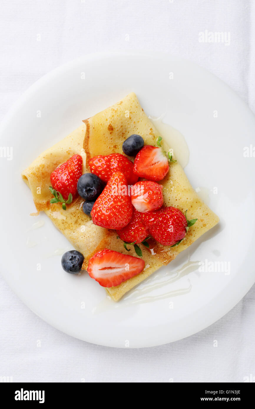 french crepes with fresh summer berries, top view Stock Photo - Alamy