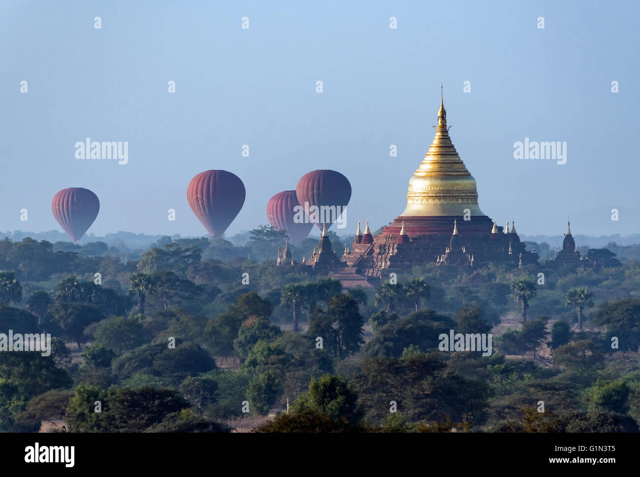 Hot-air balloons land near Dhammayazika Pagoda, Bagan, Burma - Myanmar ...