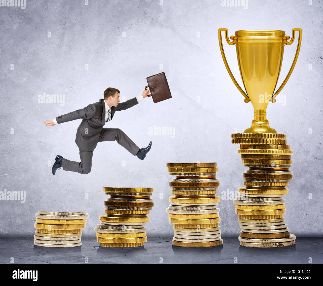 Businessman running and jumping on money stairs Stock Photo - Alamy