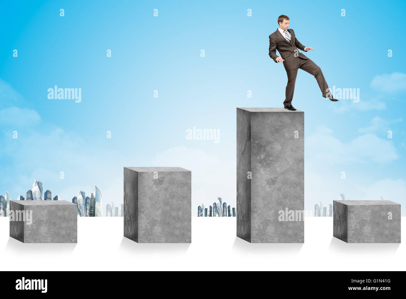 Young man stepping up for success hi-res stock photography and images ...