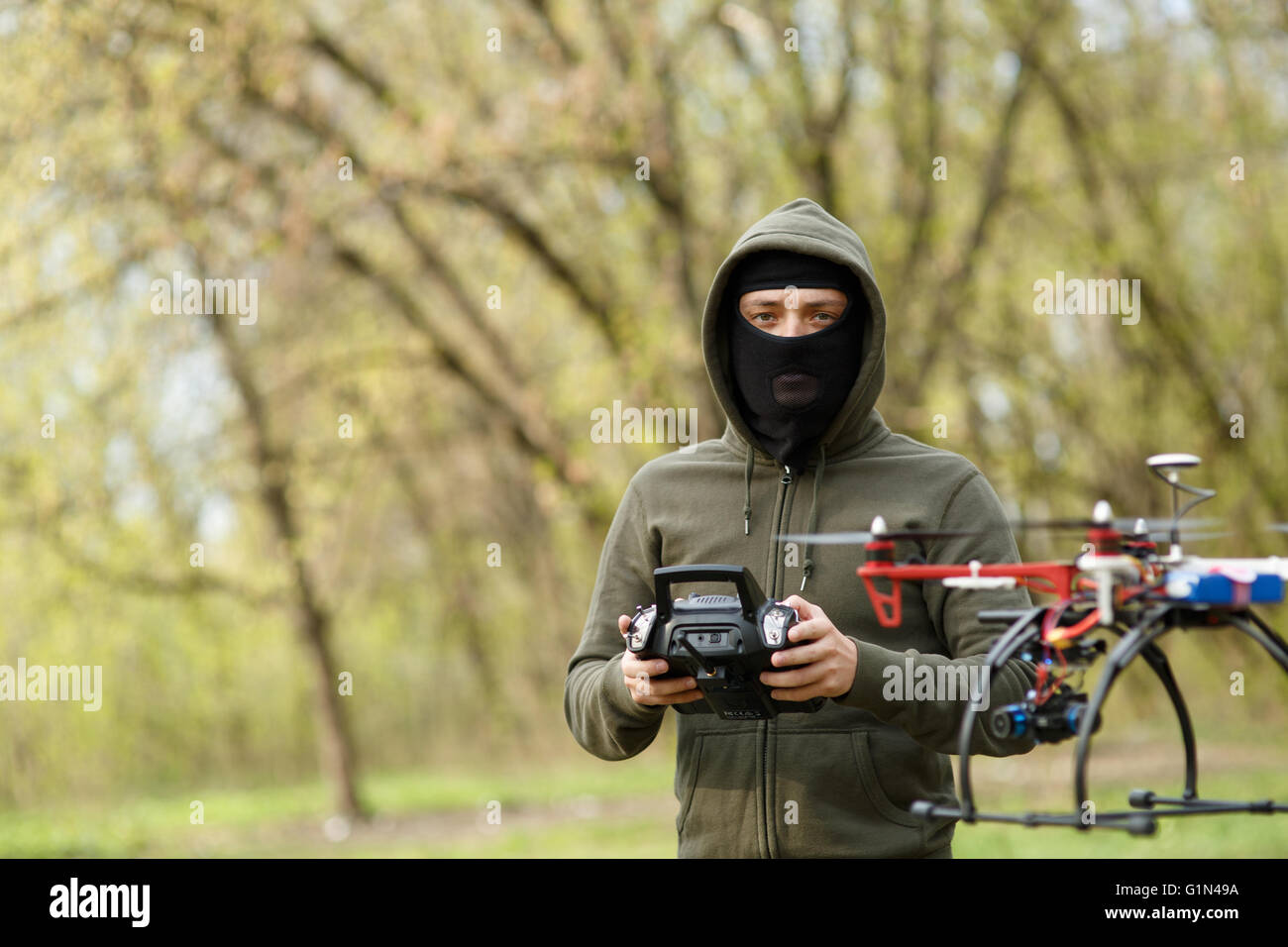 Man flying with the drone Stock Photo - Alamy