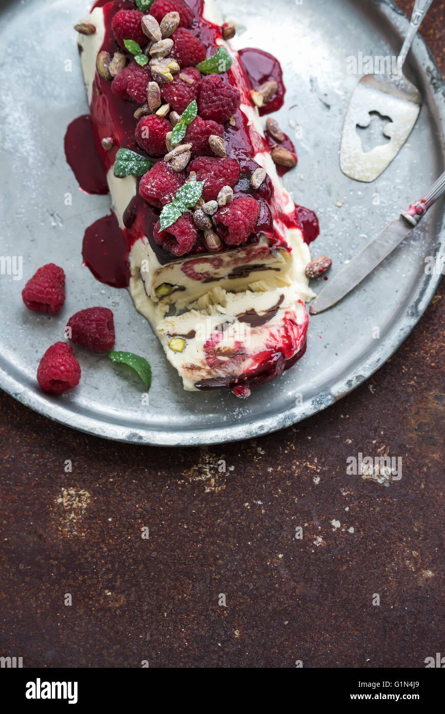 Semifreddo or italian cheese ice-cream dessert with garden berries and ...