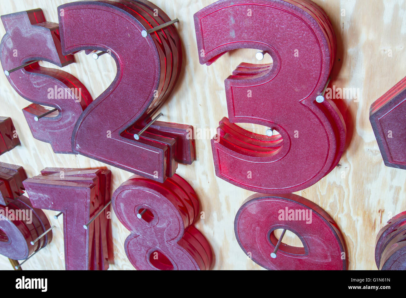 Red plastic numbers hi-res stock photography and images - Alamy