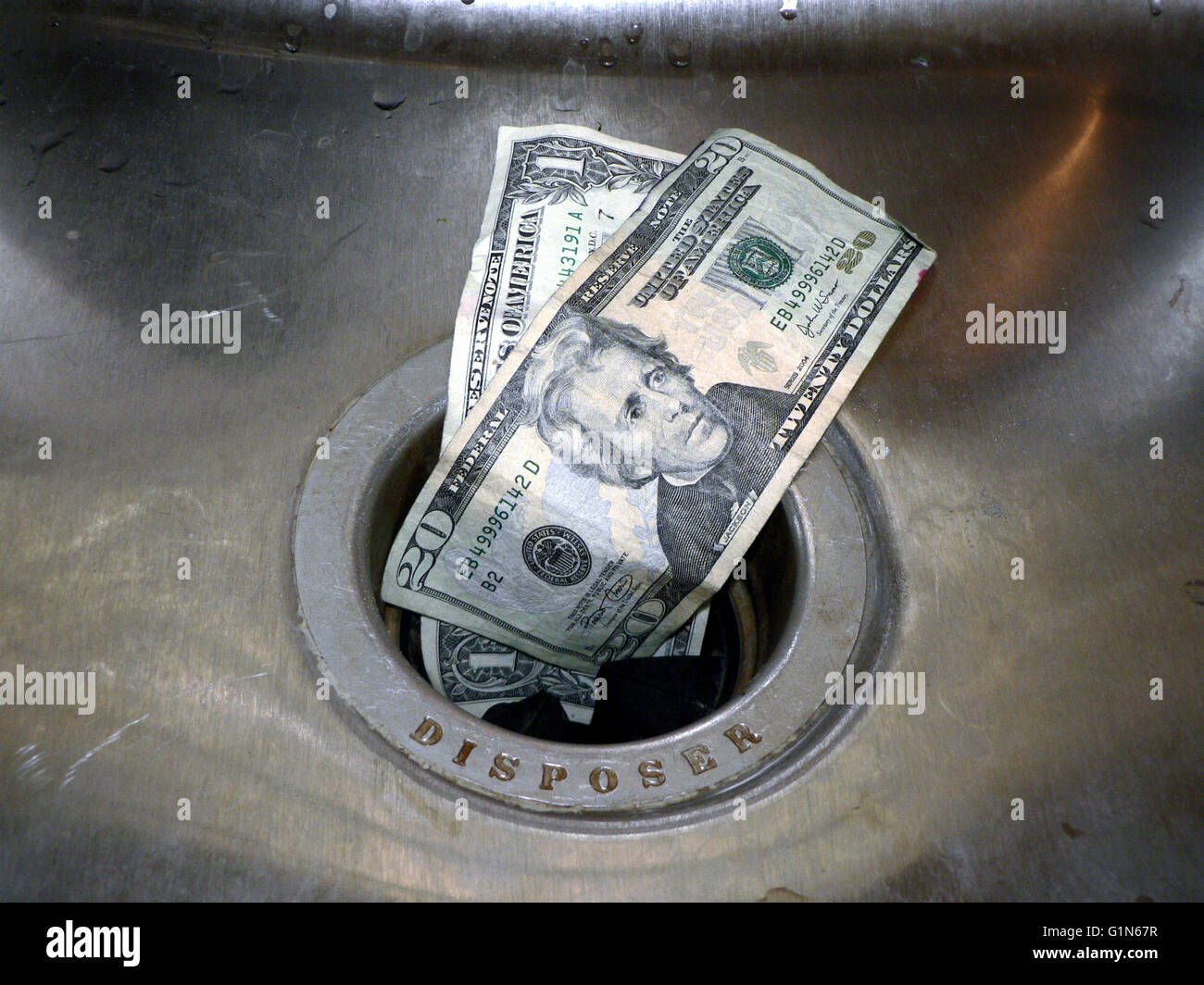 concept photo of money going down the rain Stock Photo - Alamy