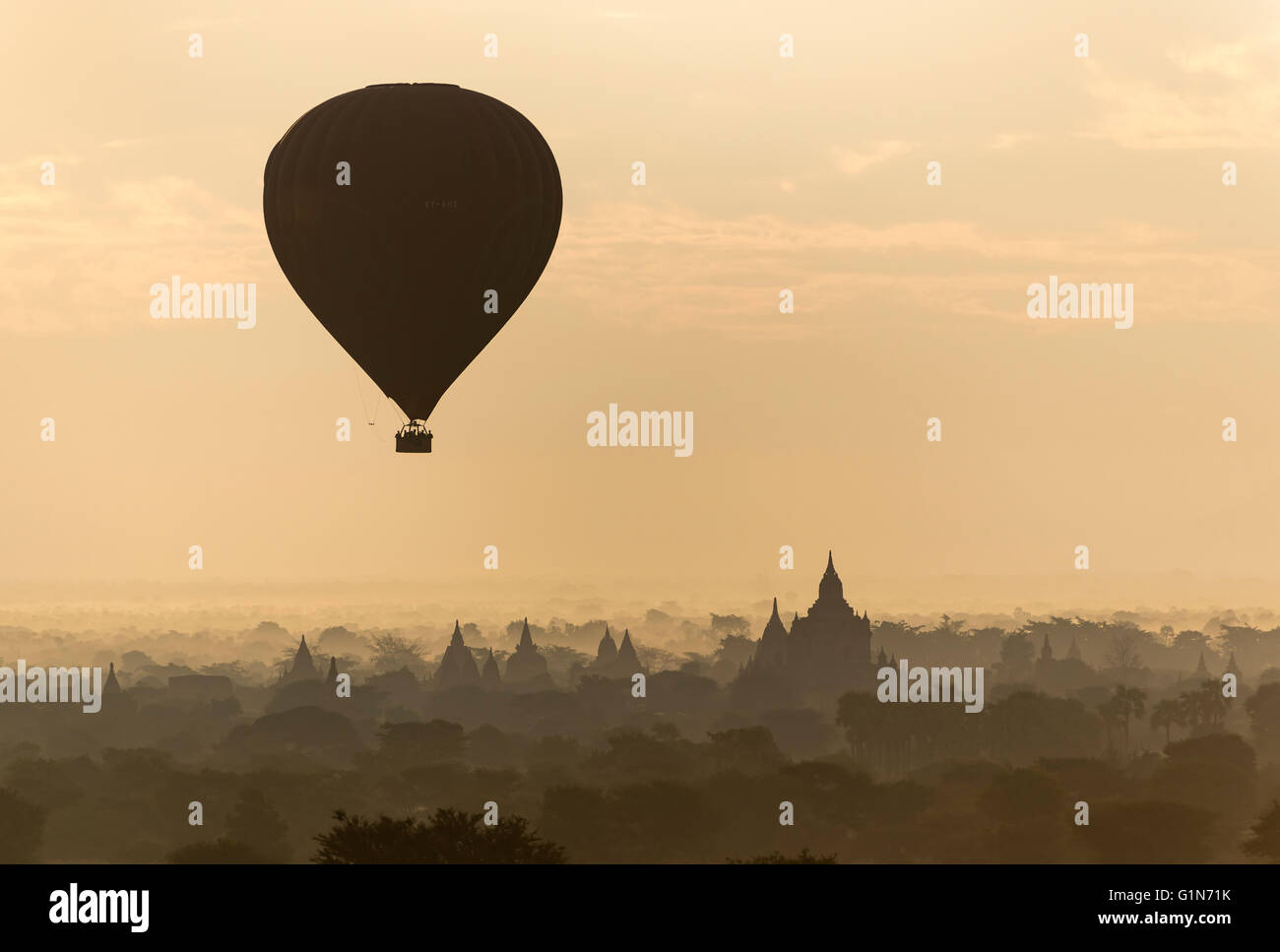 Hot-air Balloon in flight over temples of Bagan, Burma - Myanmar Stock ...