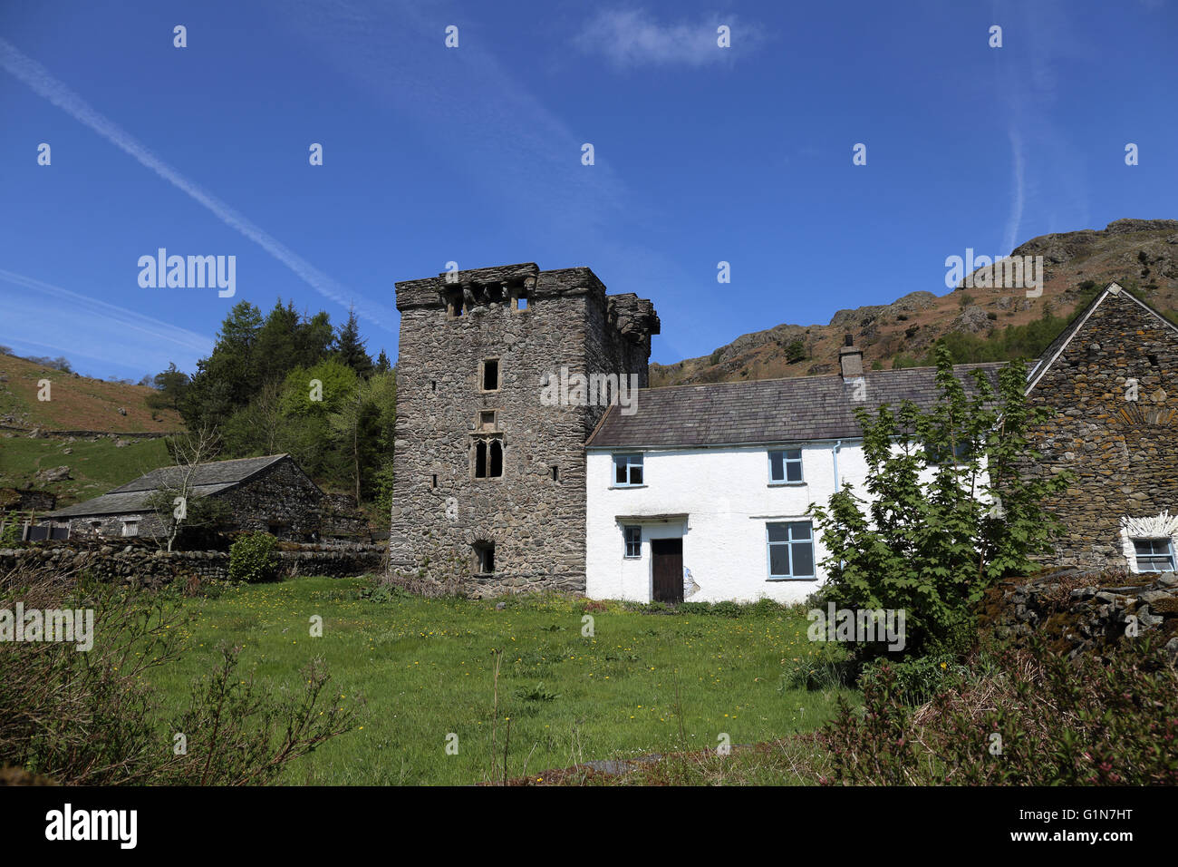 The derelict and empty Kentmere Hall, Peel Tower and farmhouse in ...