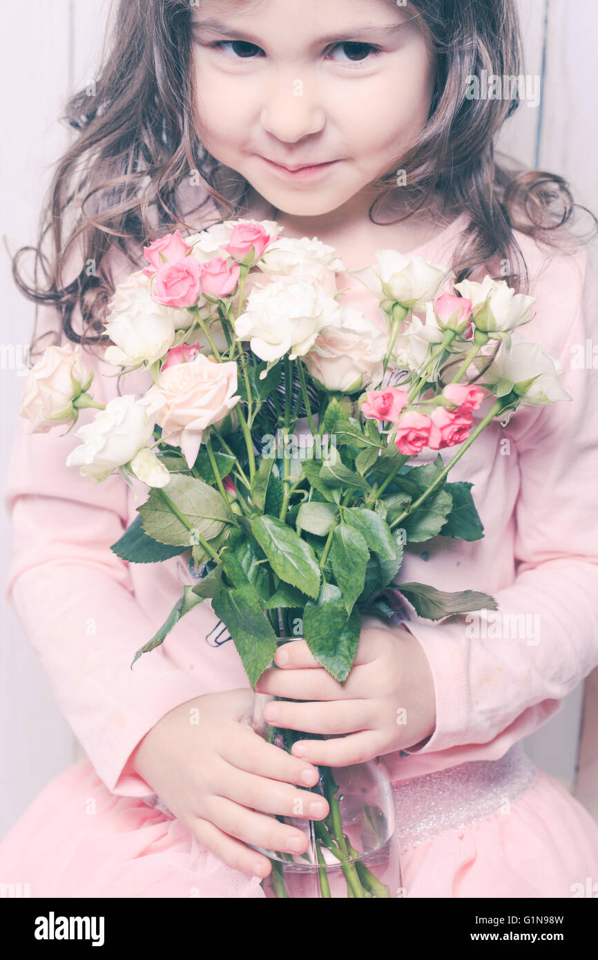 Girl with roses Stock Photo - Alamy