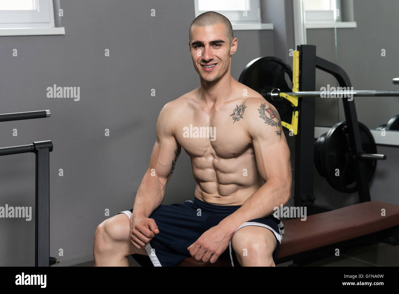 Good Looking And Attractive Young Man With Muscular Body Relaxing In ...