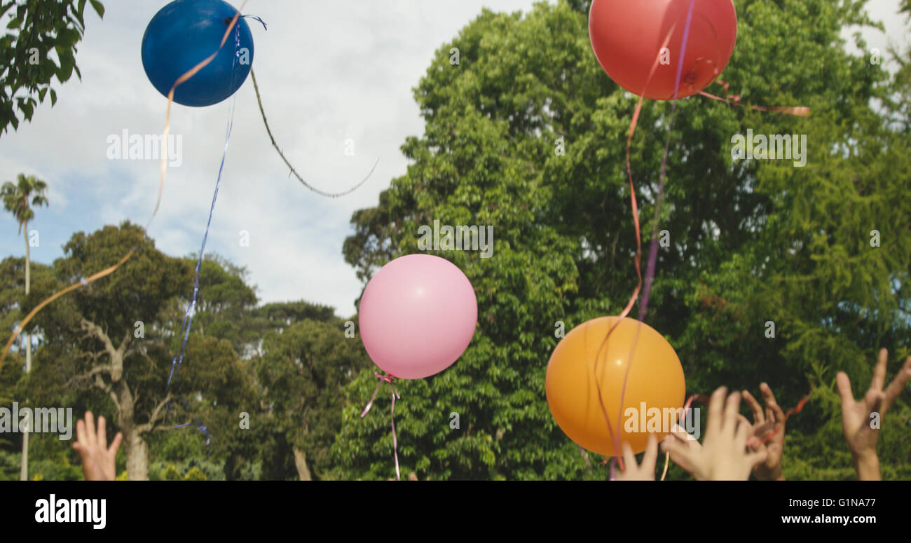 Children with balloons Stock Photo - Alamy
