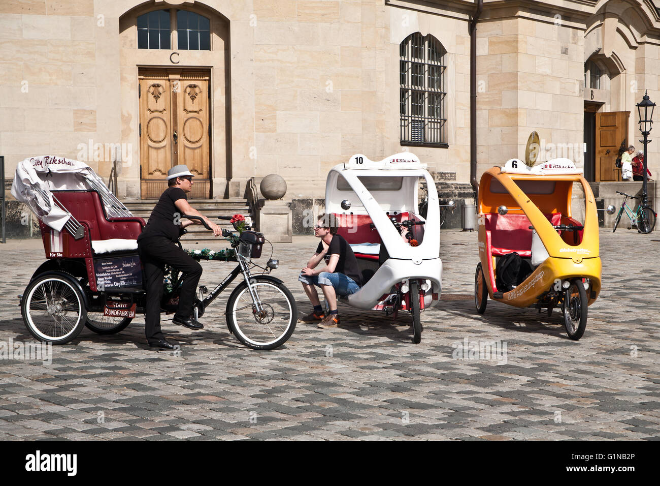 Rickshaw riders and vehicles in Dresden, Germany Stock Photo - Alamy