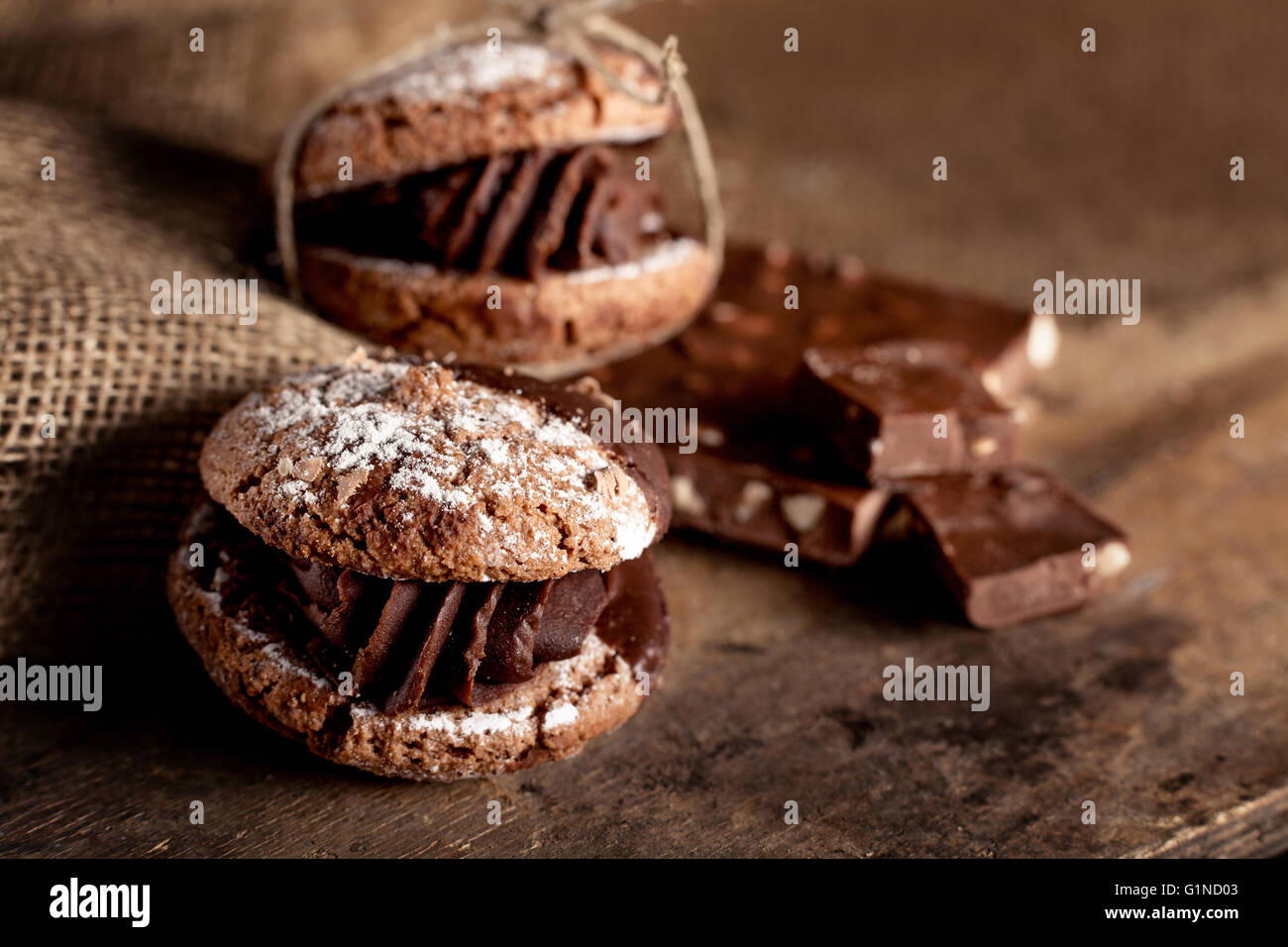 Italian maroni cookies with pieces of chocolate on old wooden ...