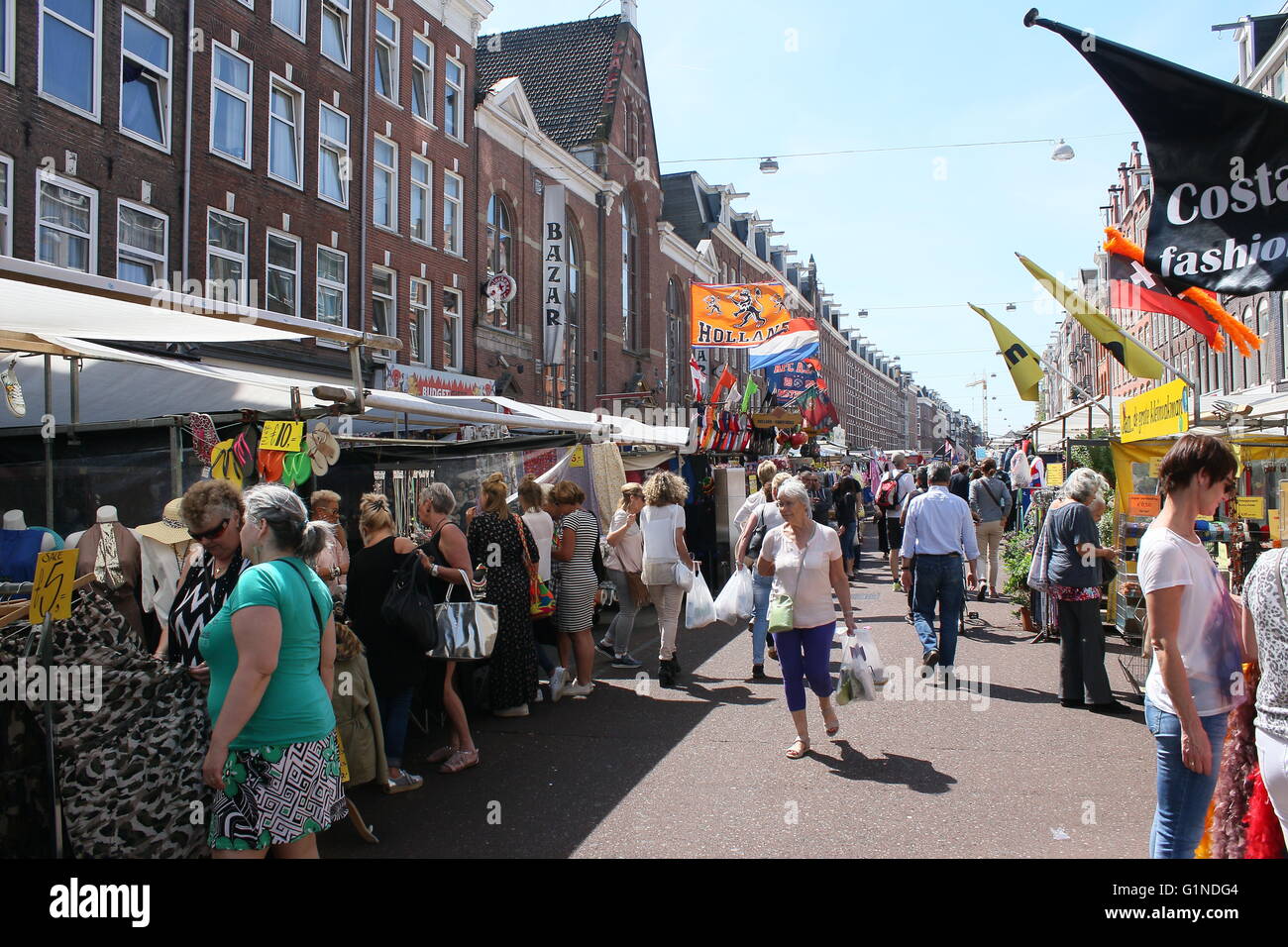 Street vendors and people shopping at busy Albert Cuyp Market, de Pijp ...