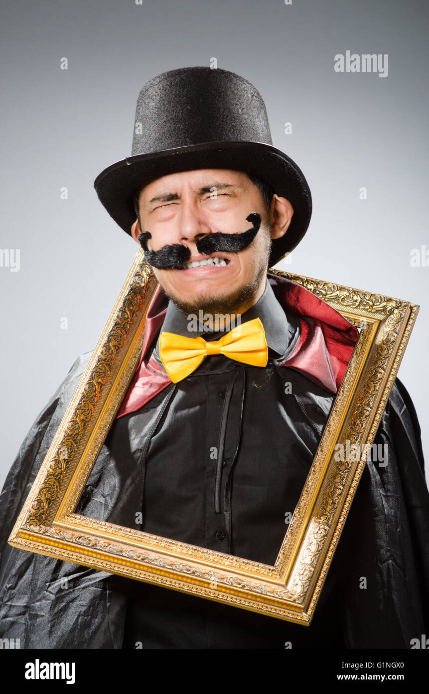 Funny man with picture frame Stock Photo - Alamy