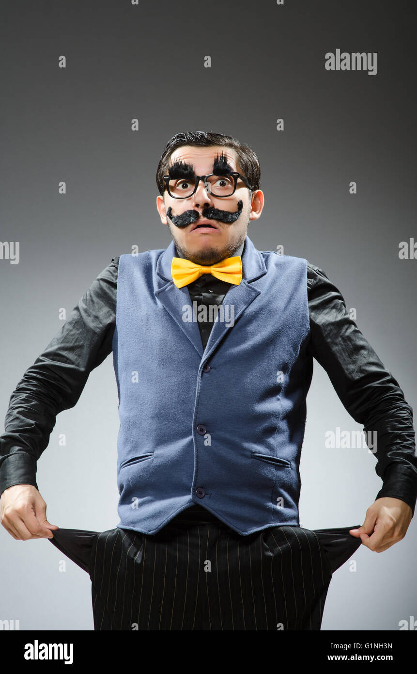 Funny man against dark background Stock Photo - Alamy