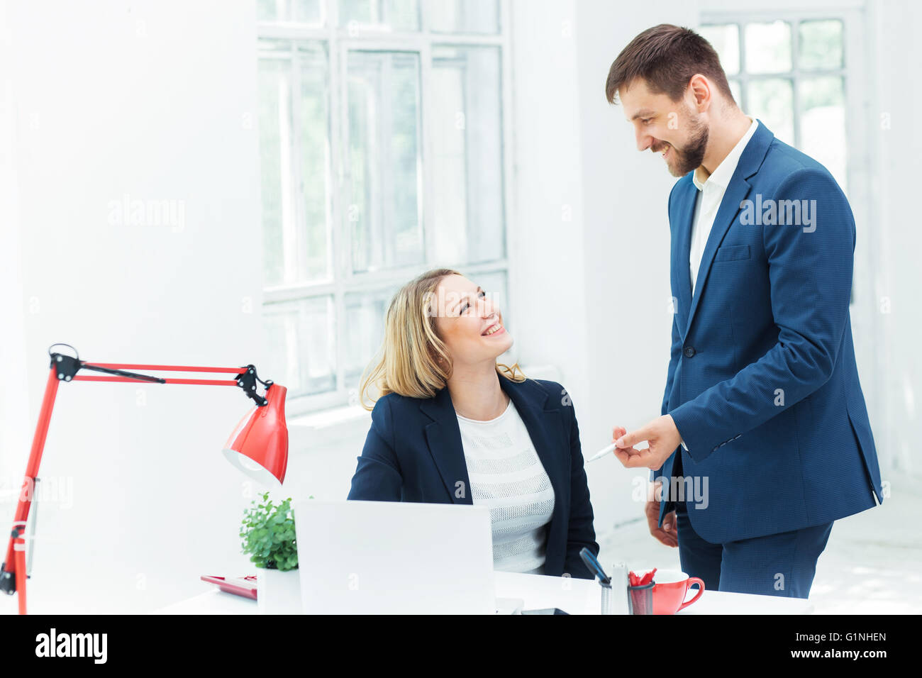 Male and female office workers Stock Photo - Alamy