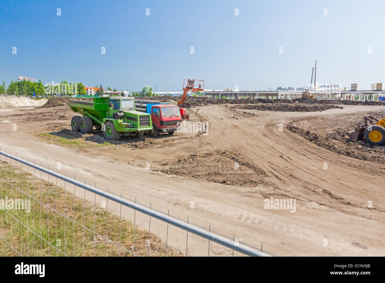 The group of construction machinery is parked at building site Stock ...