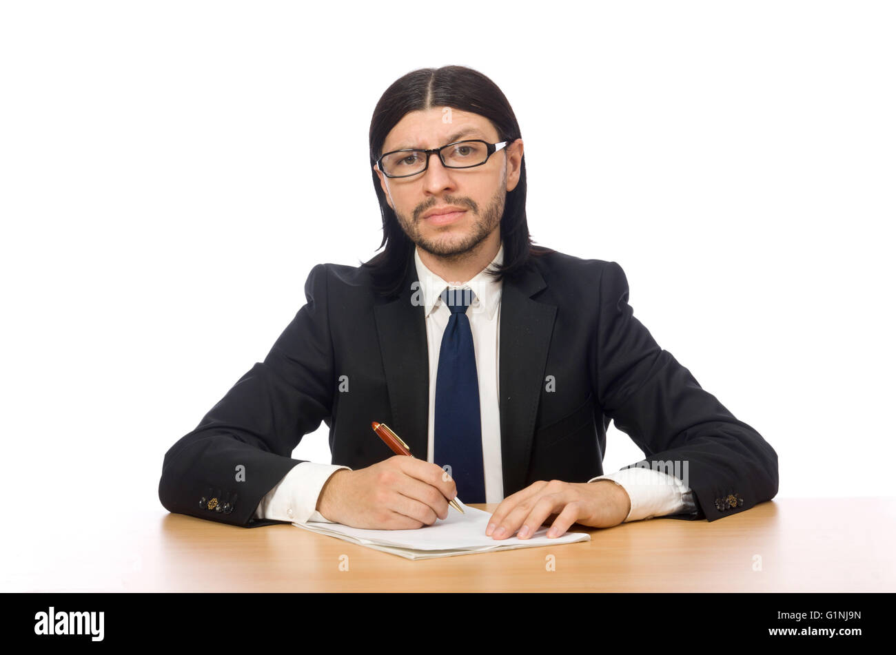 Businessman writing at workplace isolated on white Stock Photo - Alamy